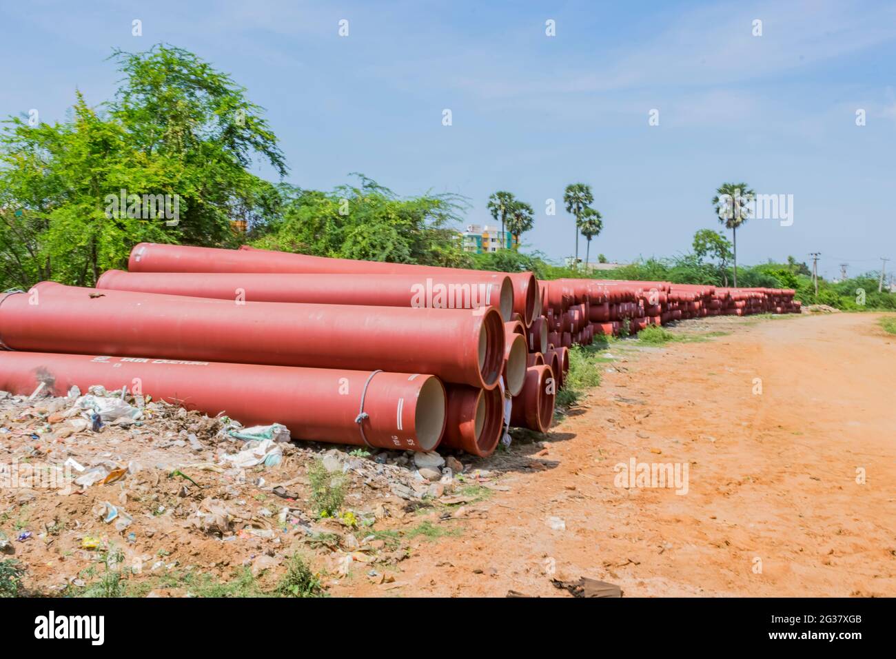 ductile iron pipes stocked in open space of a rural village store yard ...