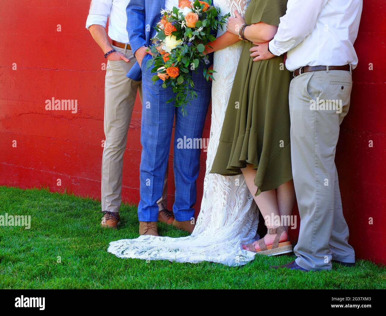 Wedding couple bride and groom with friends in line Stock Photo - Alamy