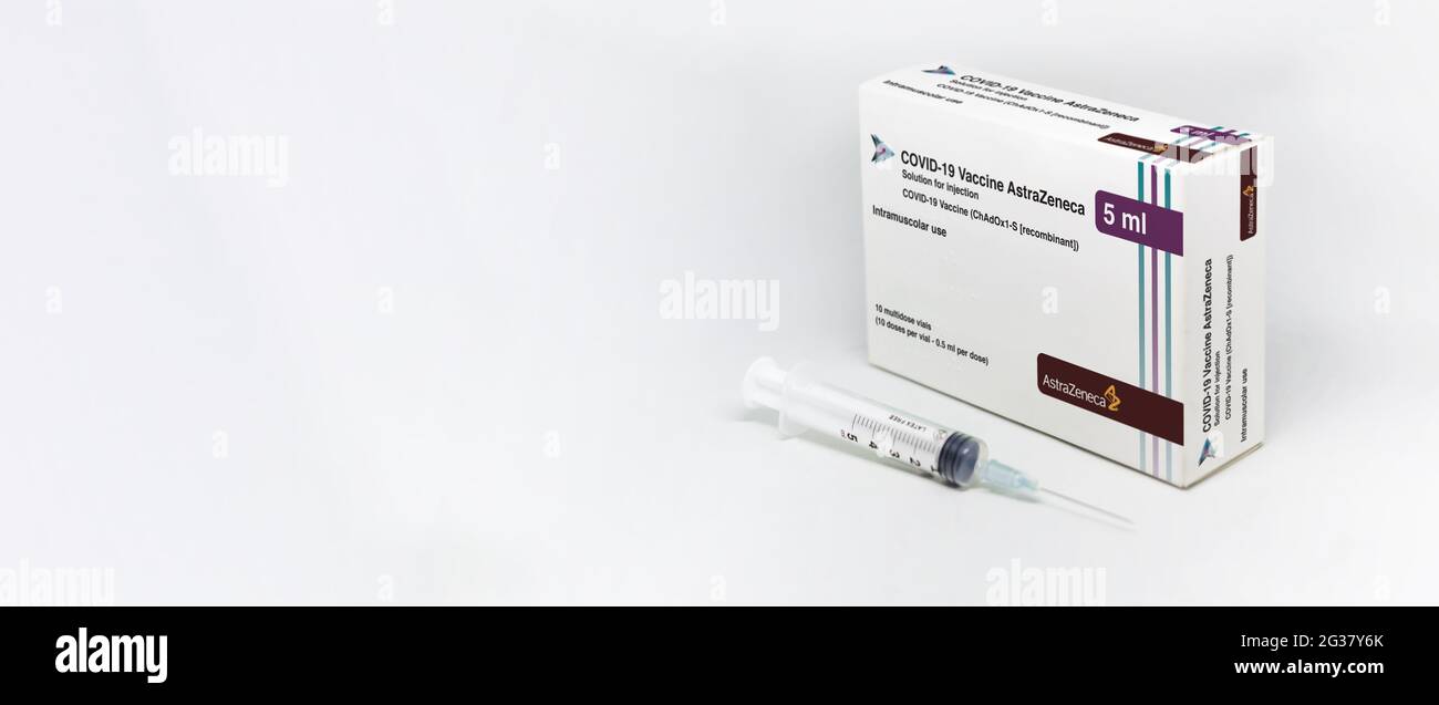 Cambridge, UK, february 5th 2021: A syringe next to the AstraZeneca ...