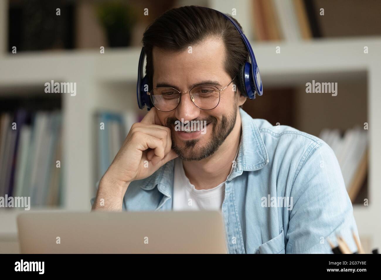 Smiling handsome young man holding distant video call Stock Photo - Alamy