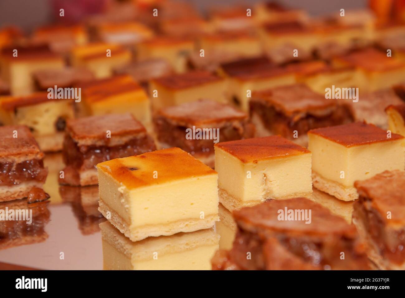 Small cut cake pieces Stock Photo - Alamy