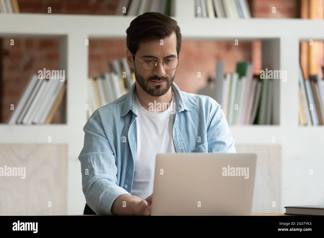 Male manager working in computer hi-res stock photography and images ...