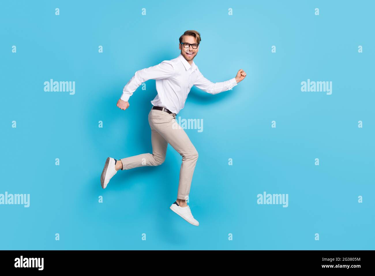 Full length body size view of attractive cheerful glad man jumping ...
