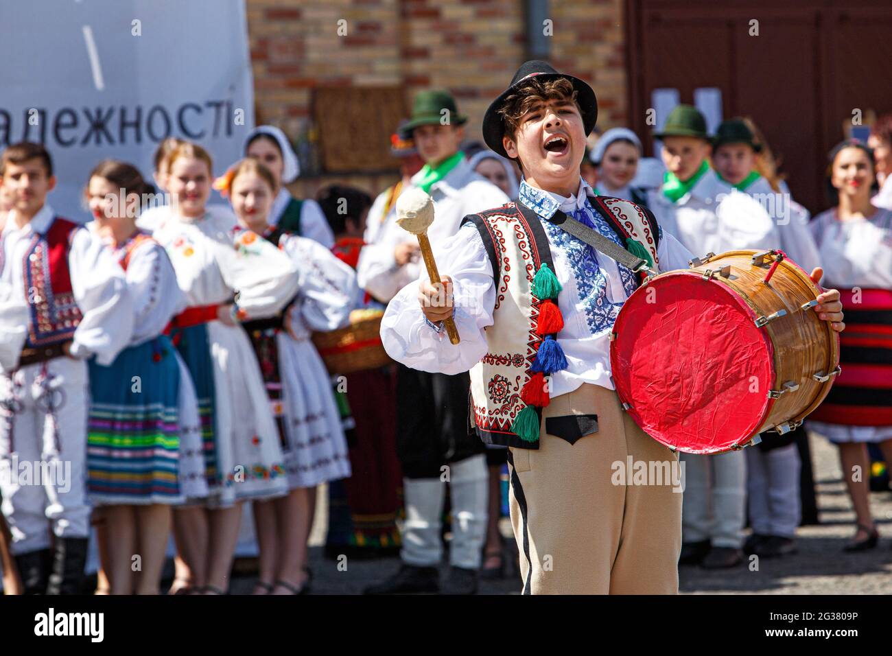 BEREHOVE, UKRAINE - JUNE 13, 2021 - A musician in a traditional costume ...