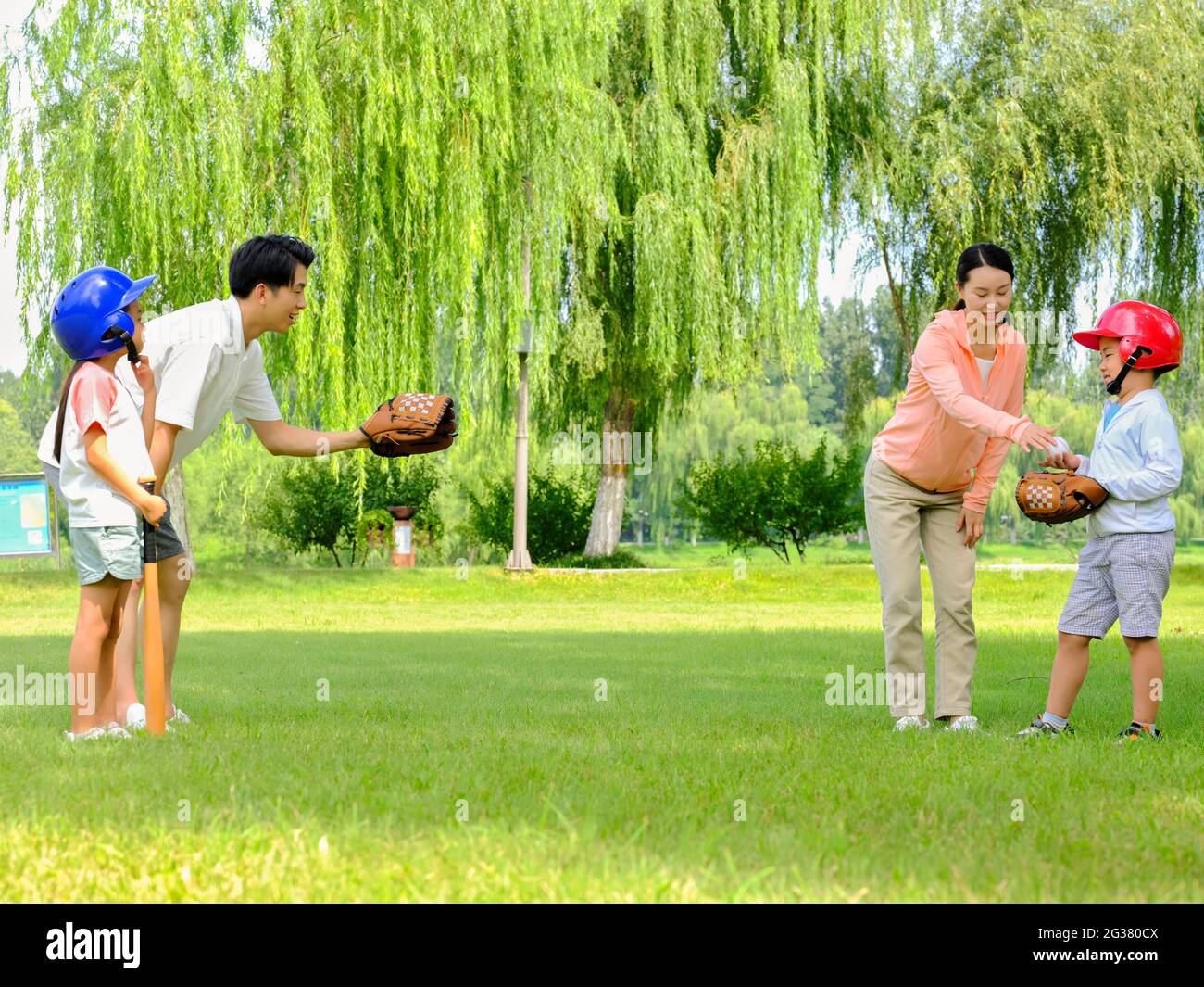 Mother son playing baseball in hi-res stock photography and images - Alamy