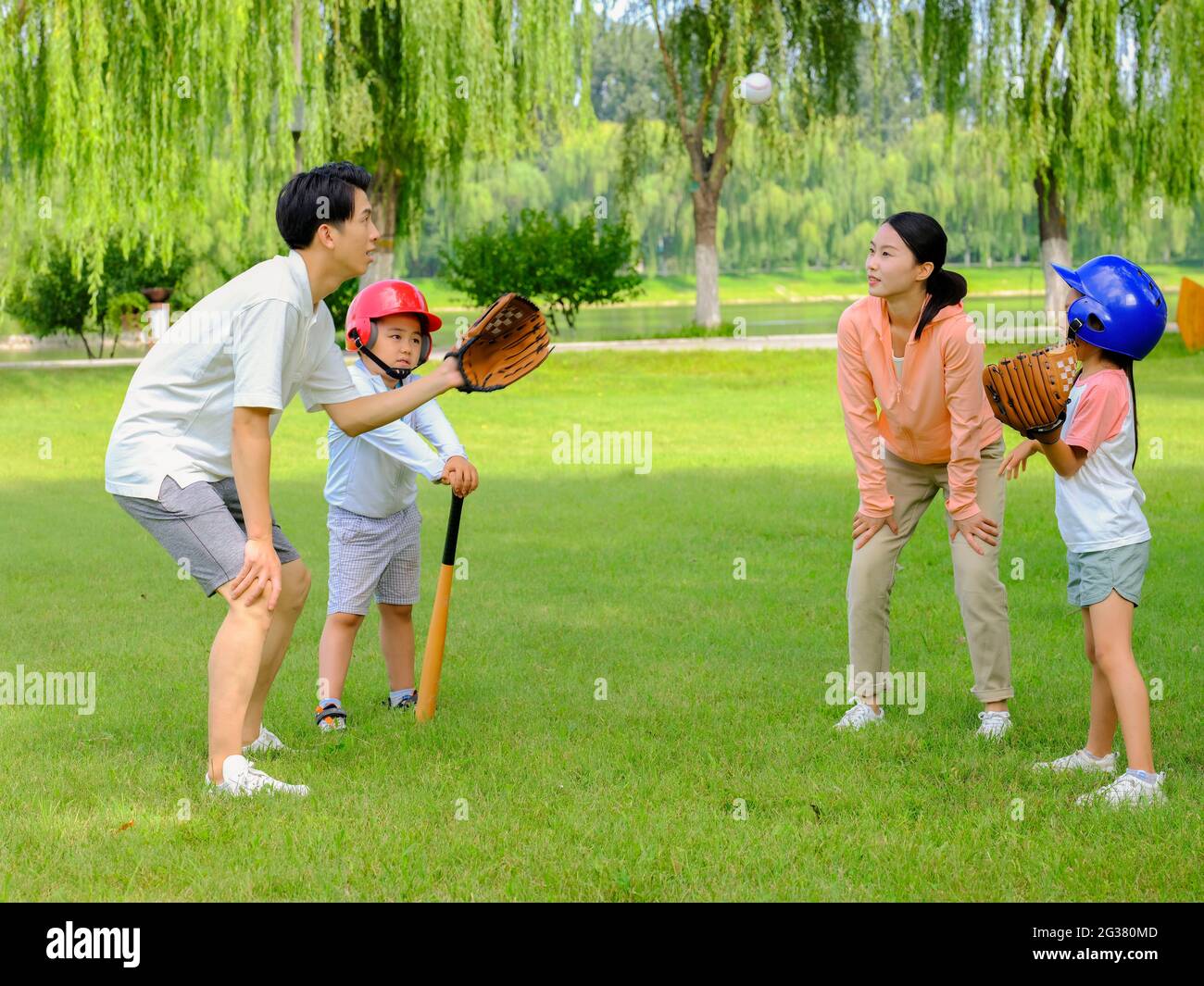 Mother son playing baseball in hi-res stock photography and images - Alamy