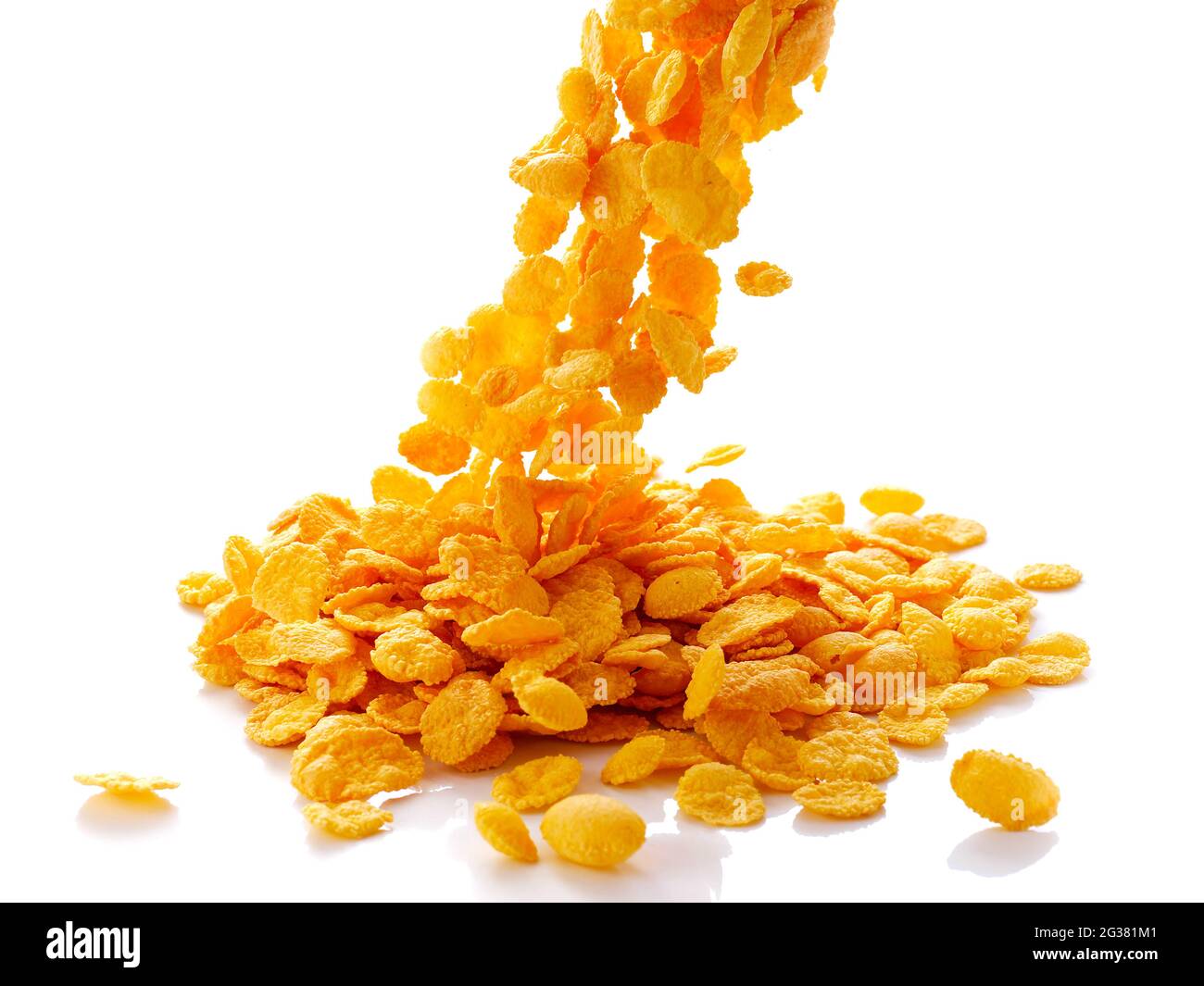closeup of falling corn flakes isolated on white background Stock Photo ...