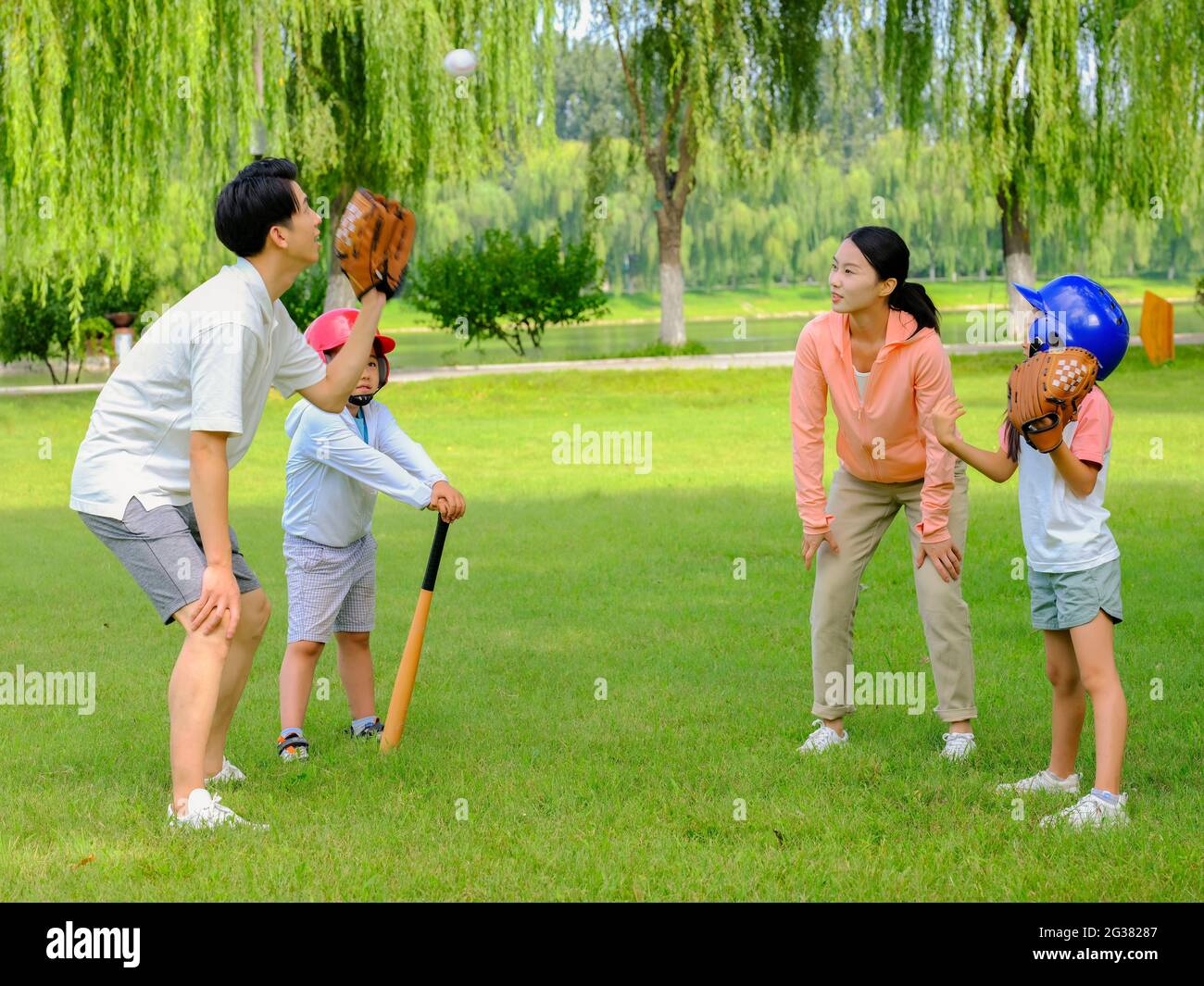 Mother son playing baseball in hi-res stock photography and images - Alamy