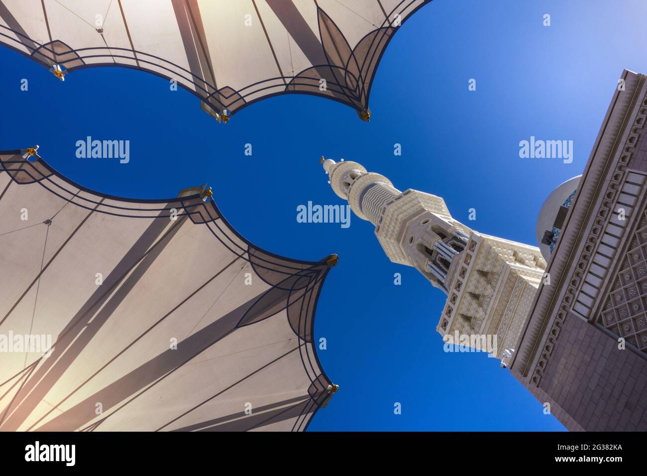 Exterior of Nabawi’s Mosque building and electronic umbrella in Medina ...