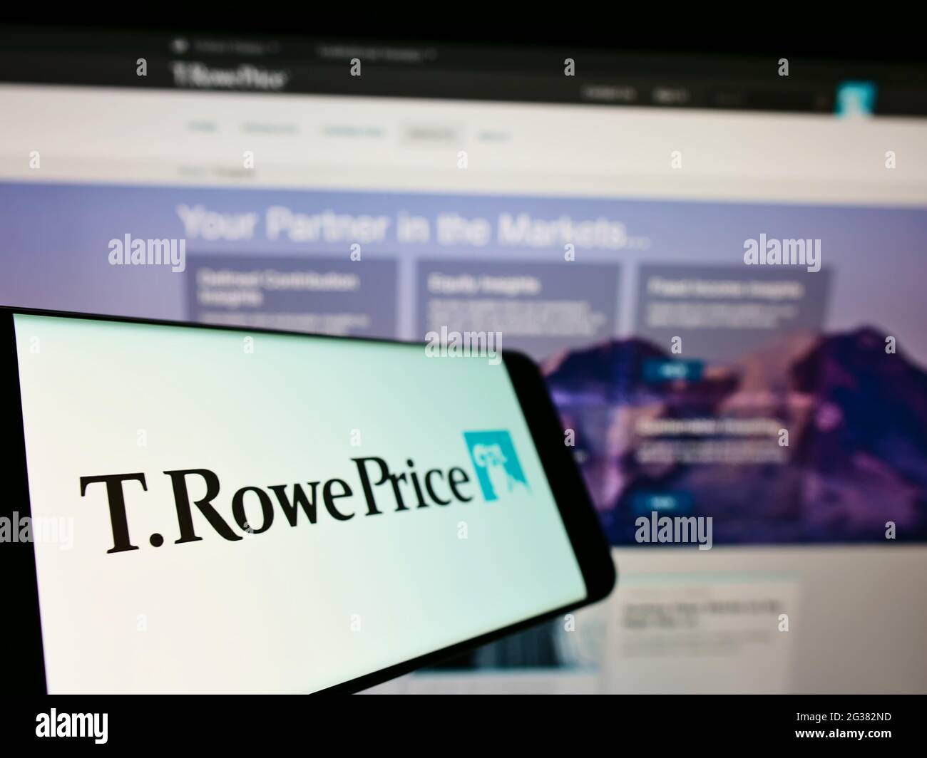 Cellphone with logo of American investment firm T. Rowe Price Group Inc ...