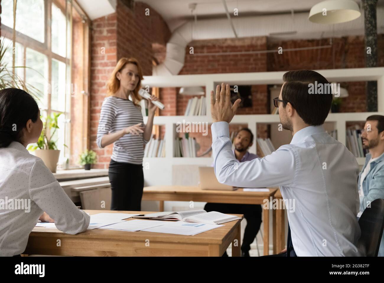 Happy multiracial people taking part in educational activity Stock ...