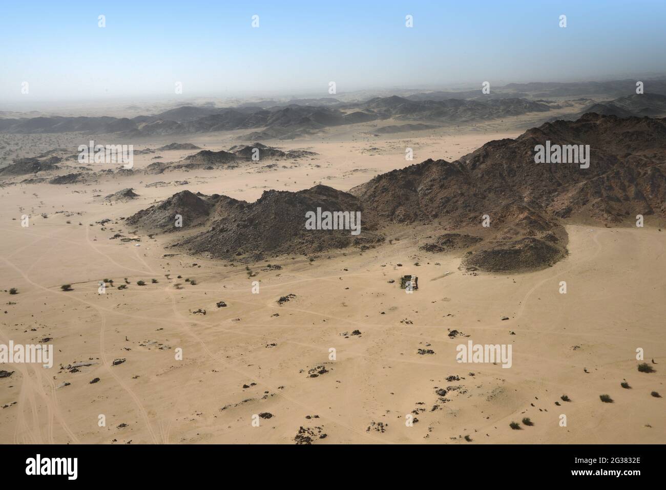 An enchanting aerial view of the vast desert landscape in Madinah ...