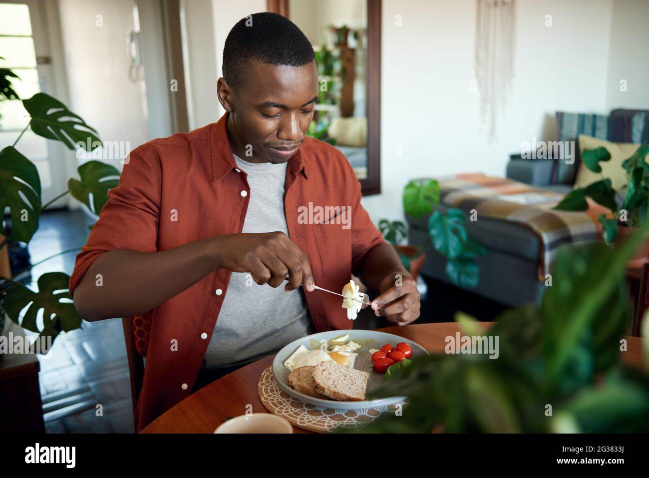 Guy Eating Breakfast