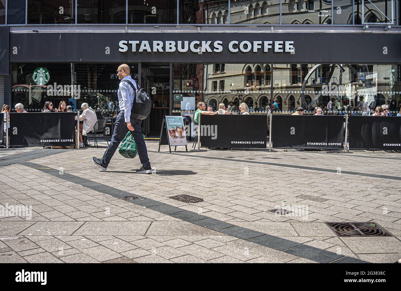 Belfast, UK. 1st June, 2021. Shopper walks past Starbucks Coffee Shop ...
