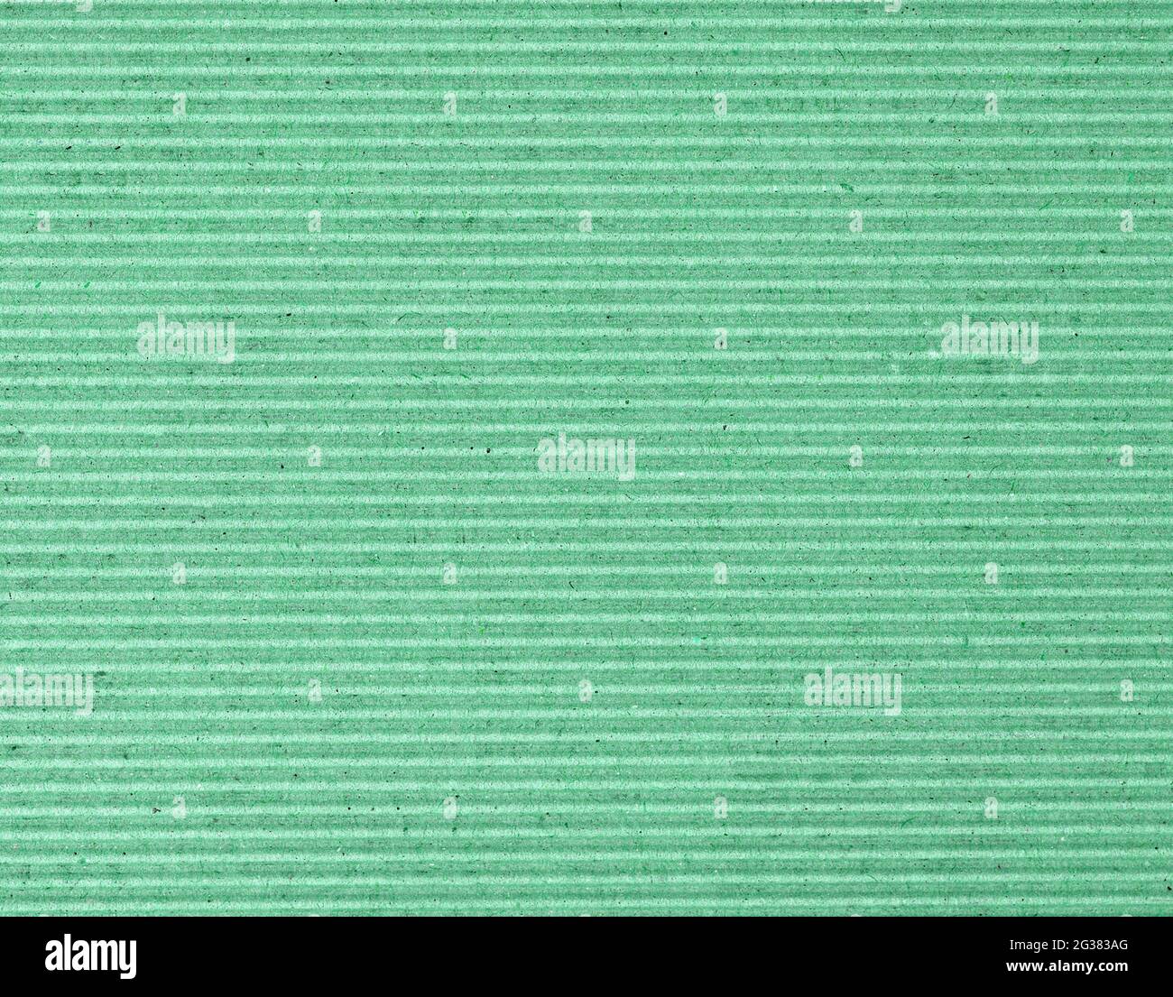 green cardboard texture useful as a background Stock Photo - Alamy