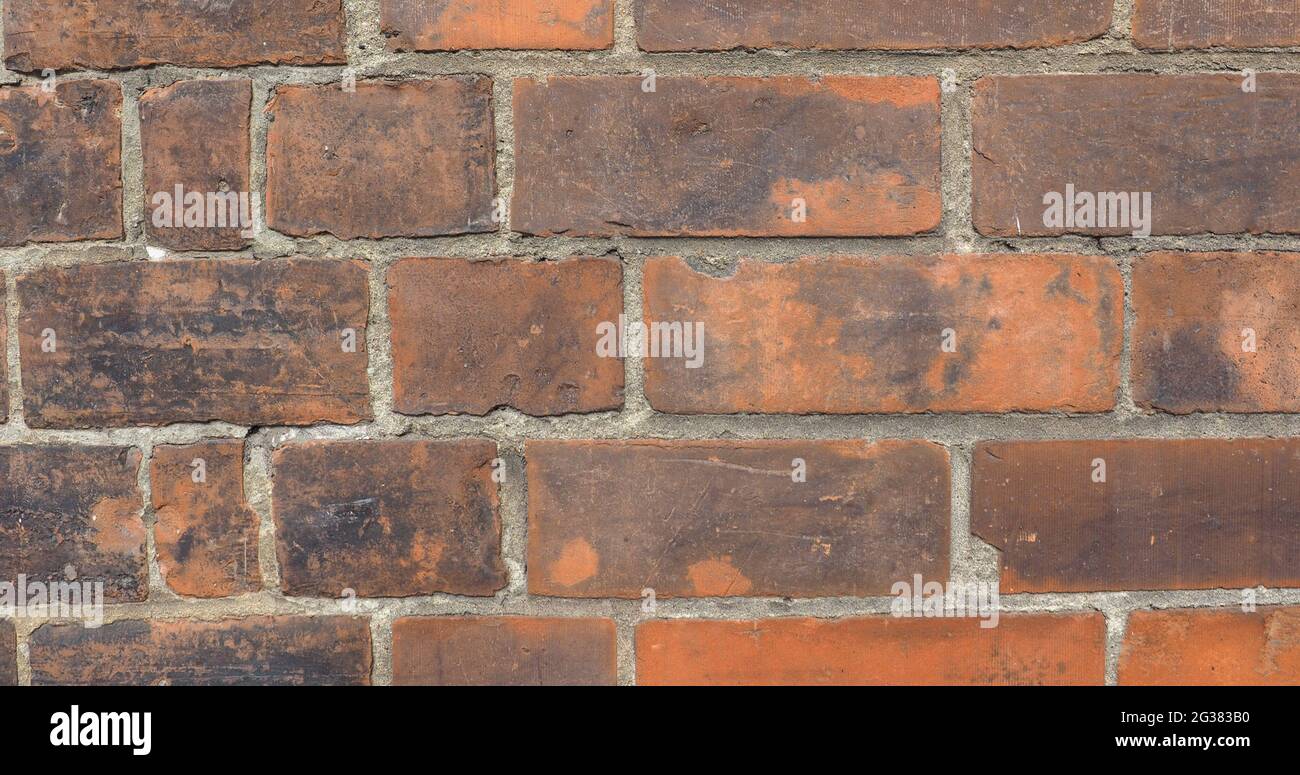 wide 4K red brick wall useful as a background Stock Photo - Alamy