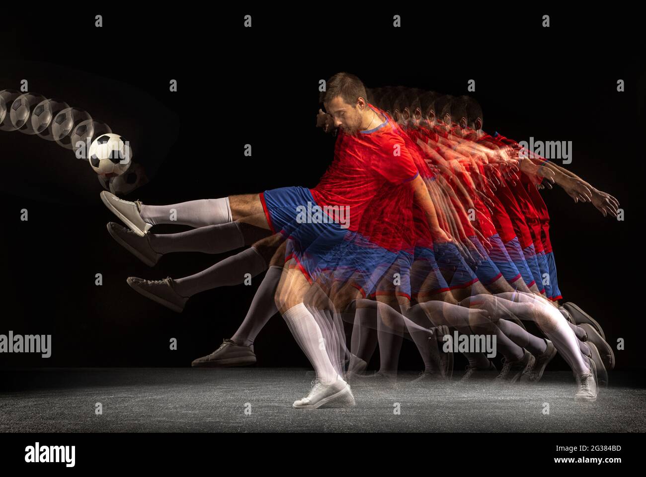 Non stop moving. Young caucasian football soccer player playing in ...