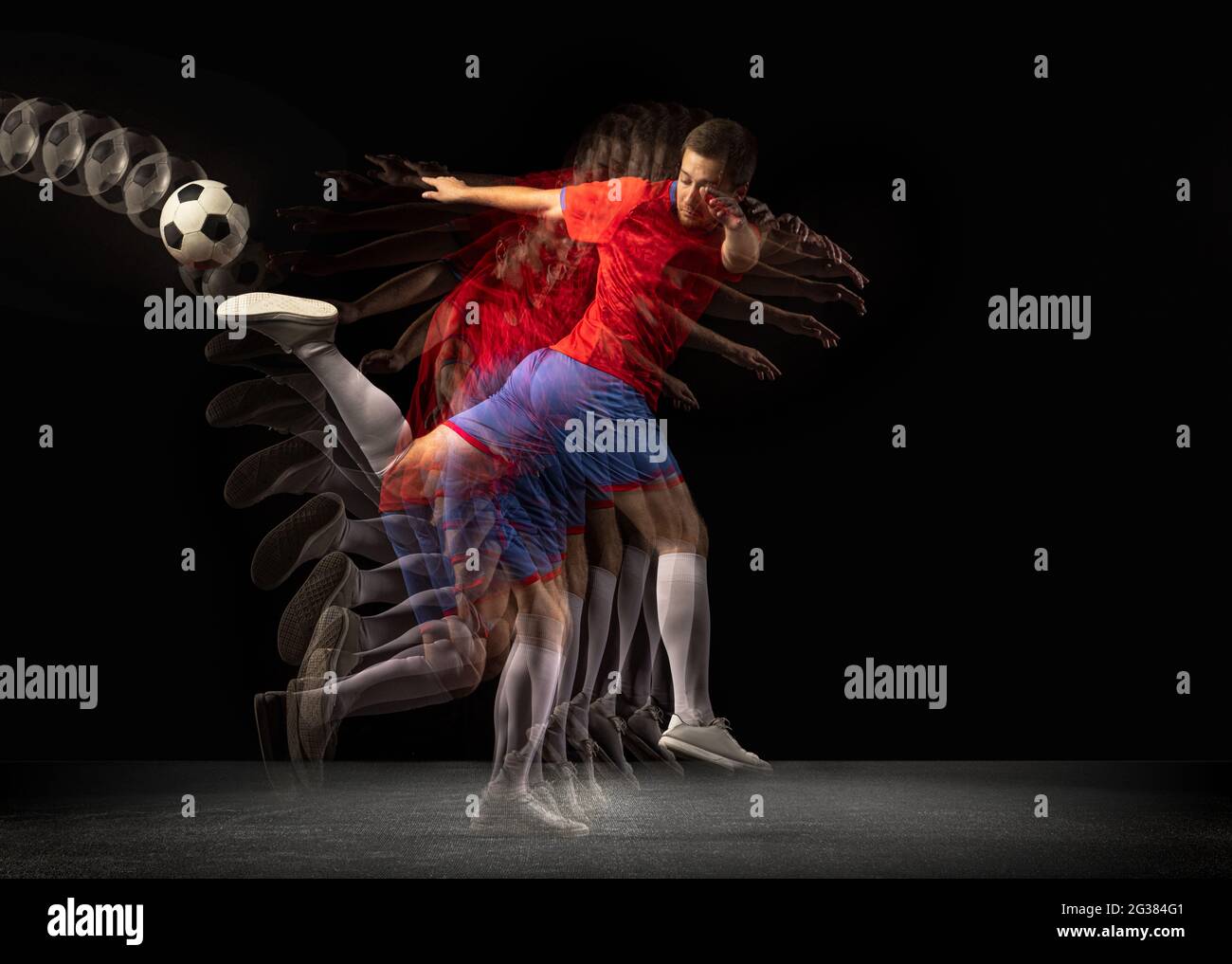 Non stop moving. Young caucasian football soccer player playing in ...