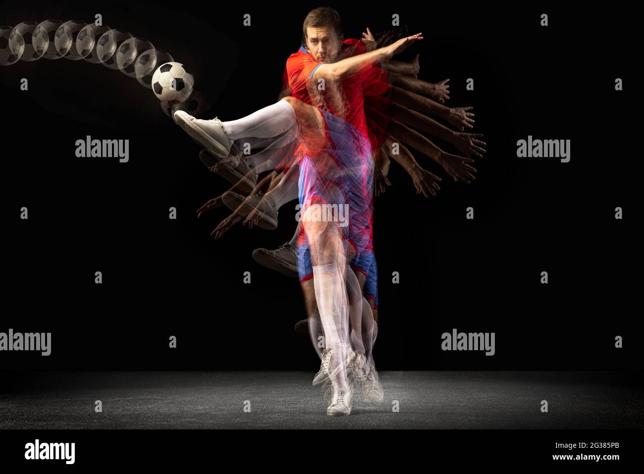 Non stop moving. Young caucasian football soccer player playing in ...