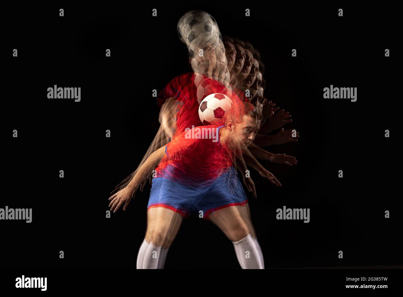 Non stop moving. Young caucasian football soccer player playing in ...
