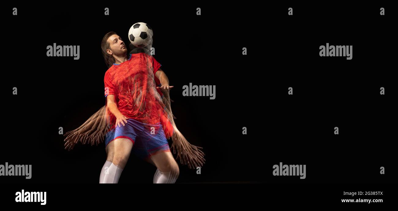 Non stop moving. Young caucasian football soccer player playing in ...