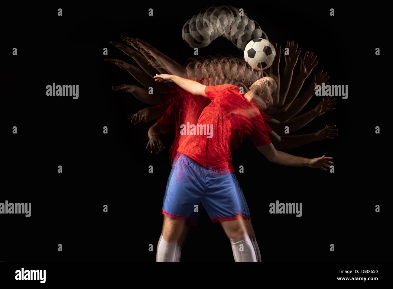 Non stop moving. Young caucasian football soccer player playing in ...