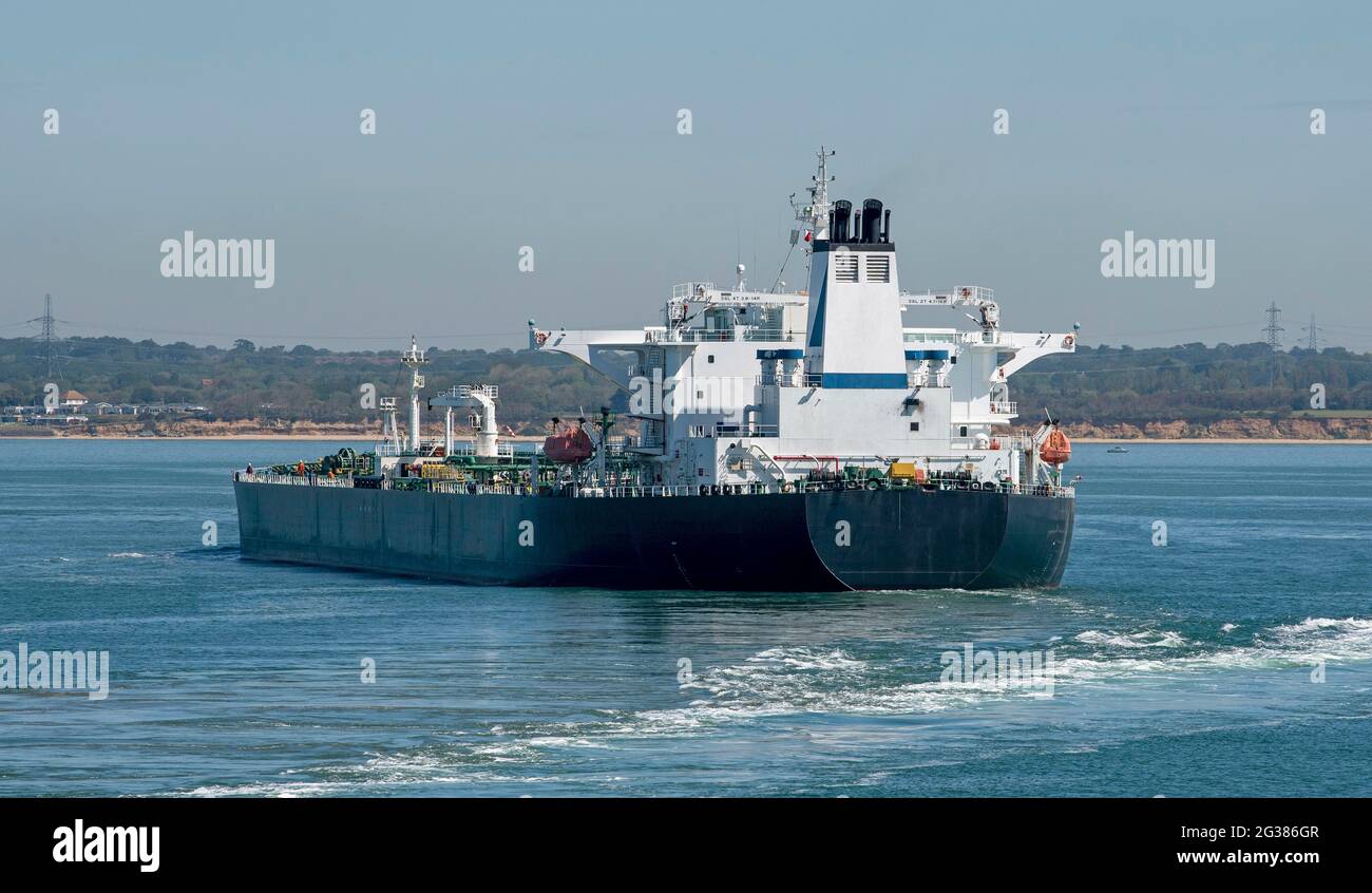 The Solent, England, UK. 2021. A heavy crude oil tanker making a turn ...