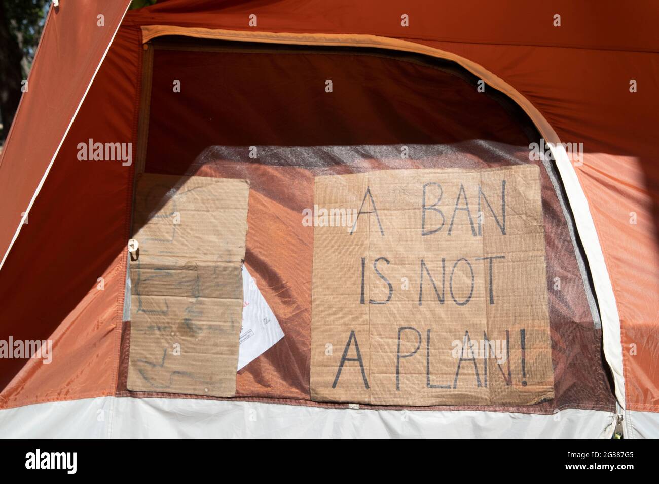 Austin, Texas, USA. 14th June, 2021. Protest sign on tent erected at ...