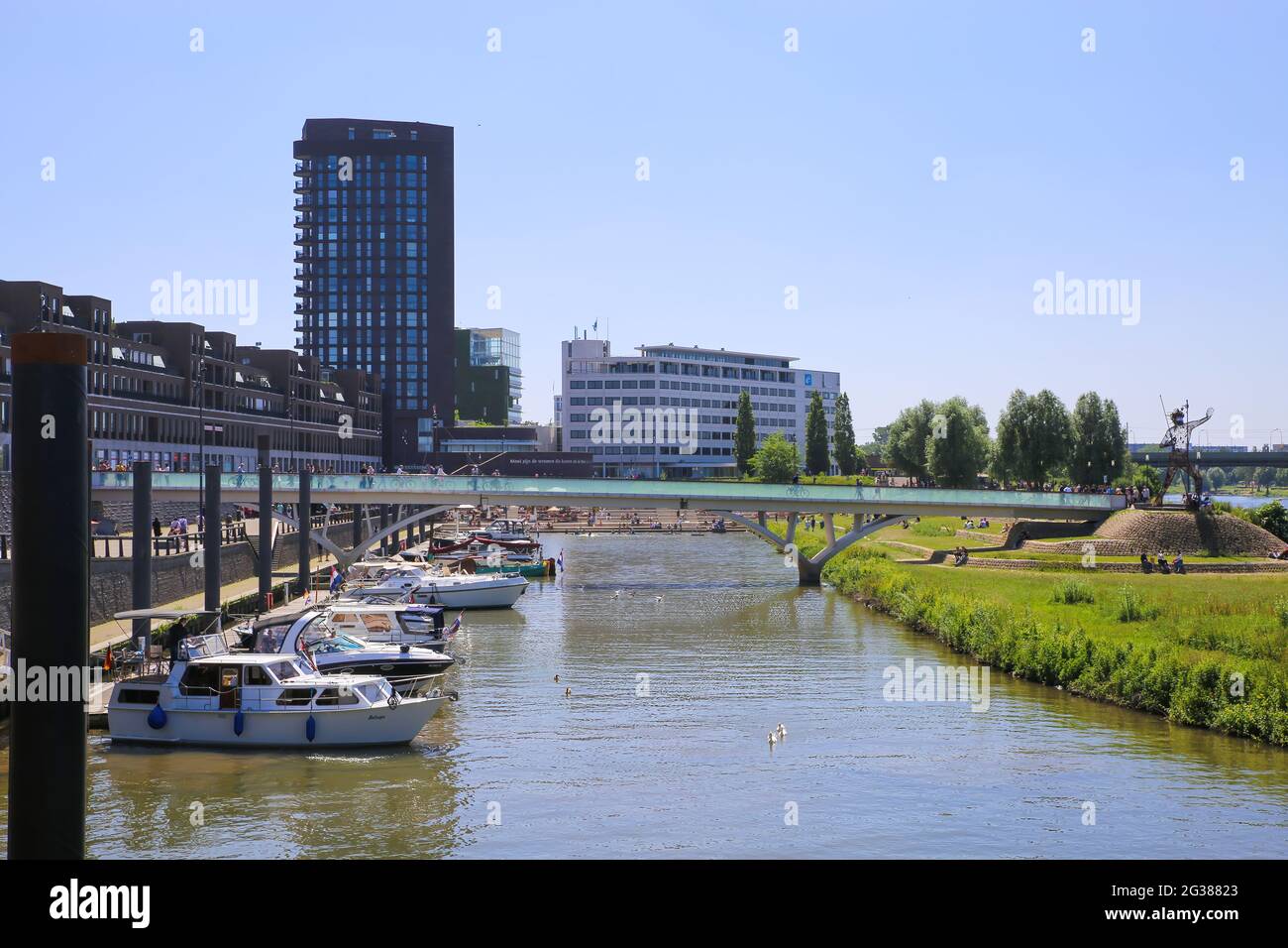 Venlo, Netherlands - June 9. 2021: View over river Maas on skyline of ...