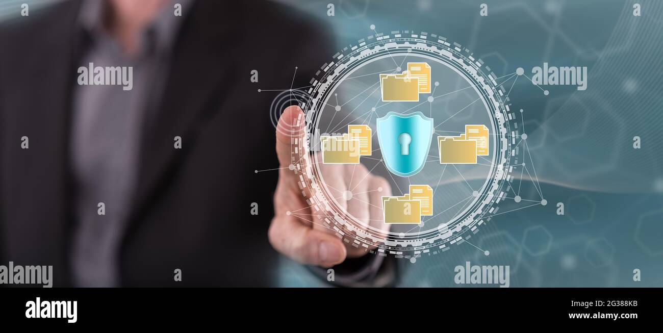Man touching a data protection concept on a touch screen with his ...