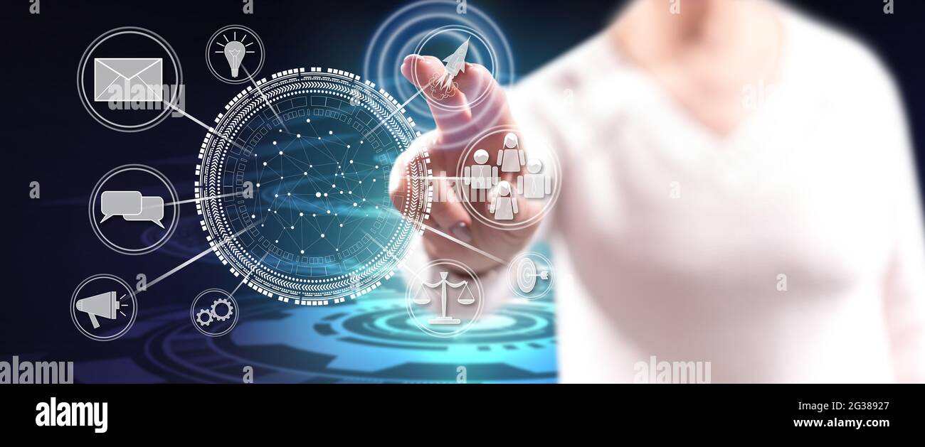 Woman touching a business networking concept on a touch screen with her ...