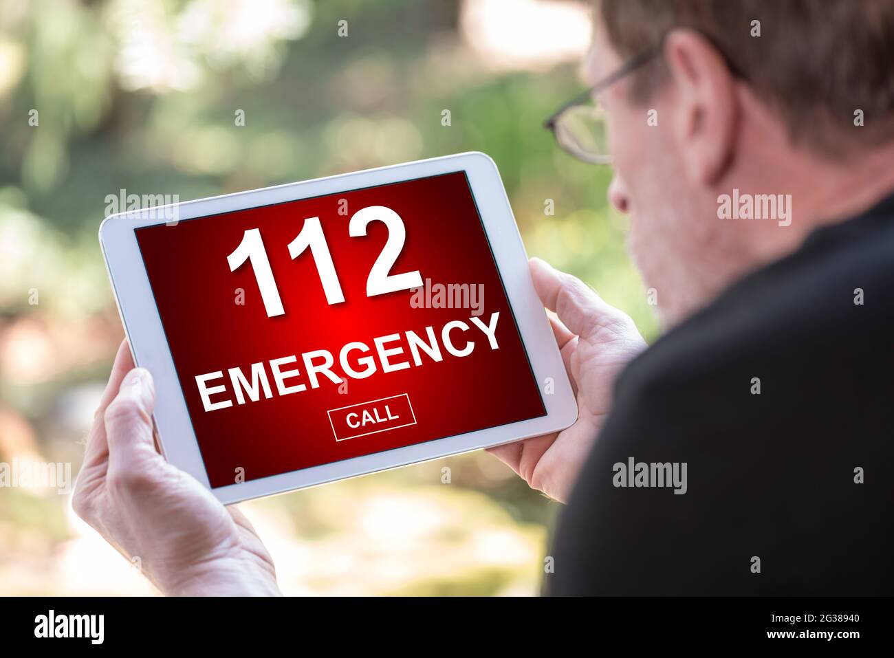 Tablet screen displaying an emergency concept Stock Photo - Alamy