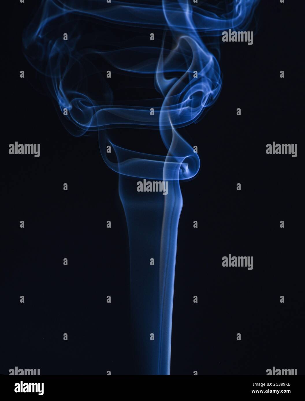 Wisp of blue smoke spiraled abstract steaming background, steam Stock ...