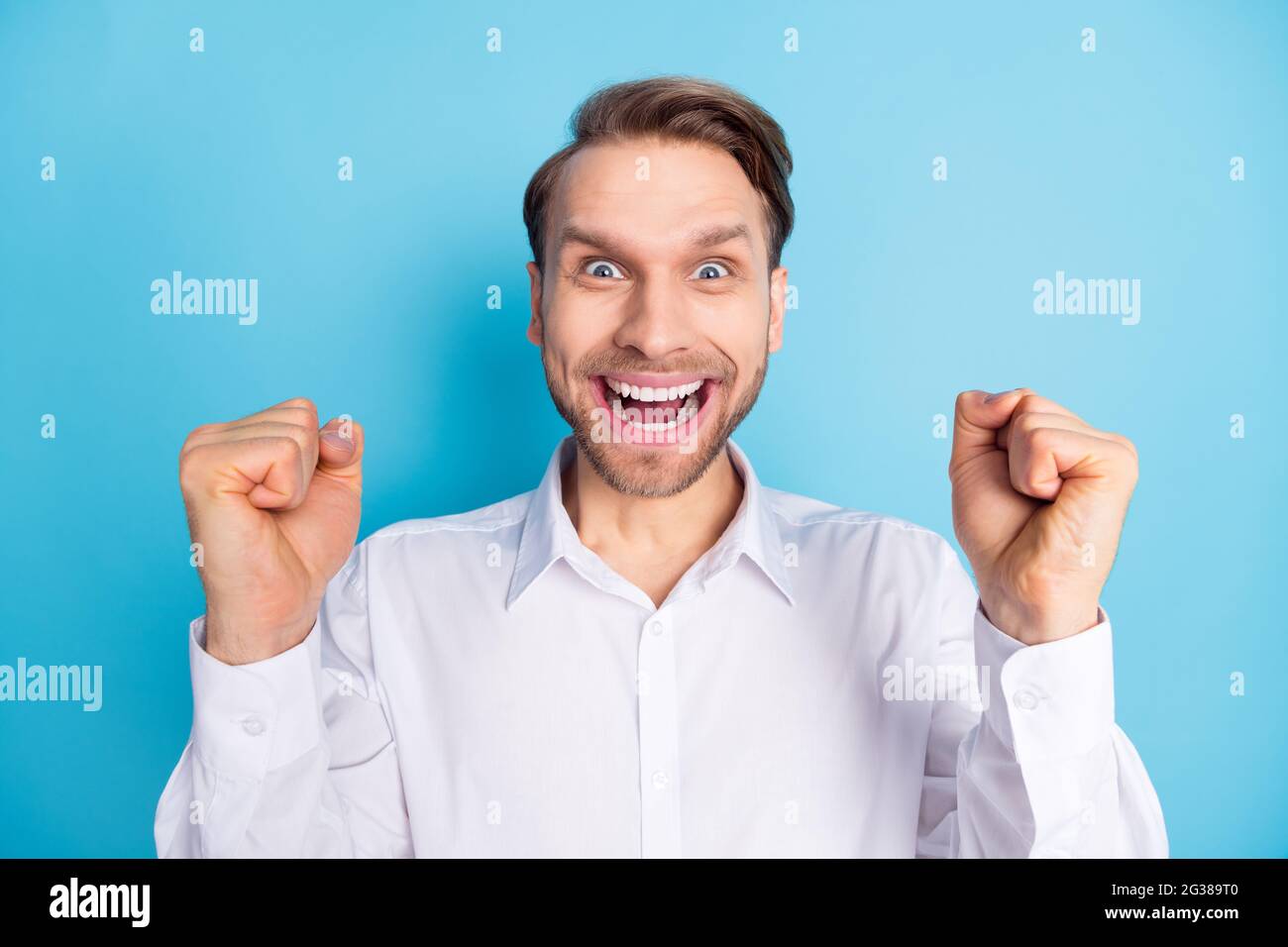 Photo of happy amazed young man crazy mood achieve success winner ...