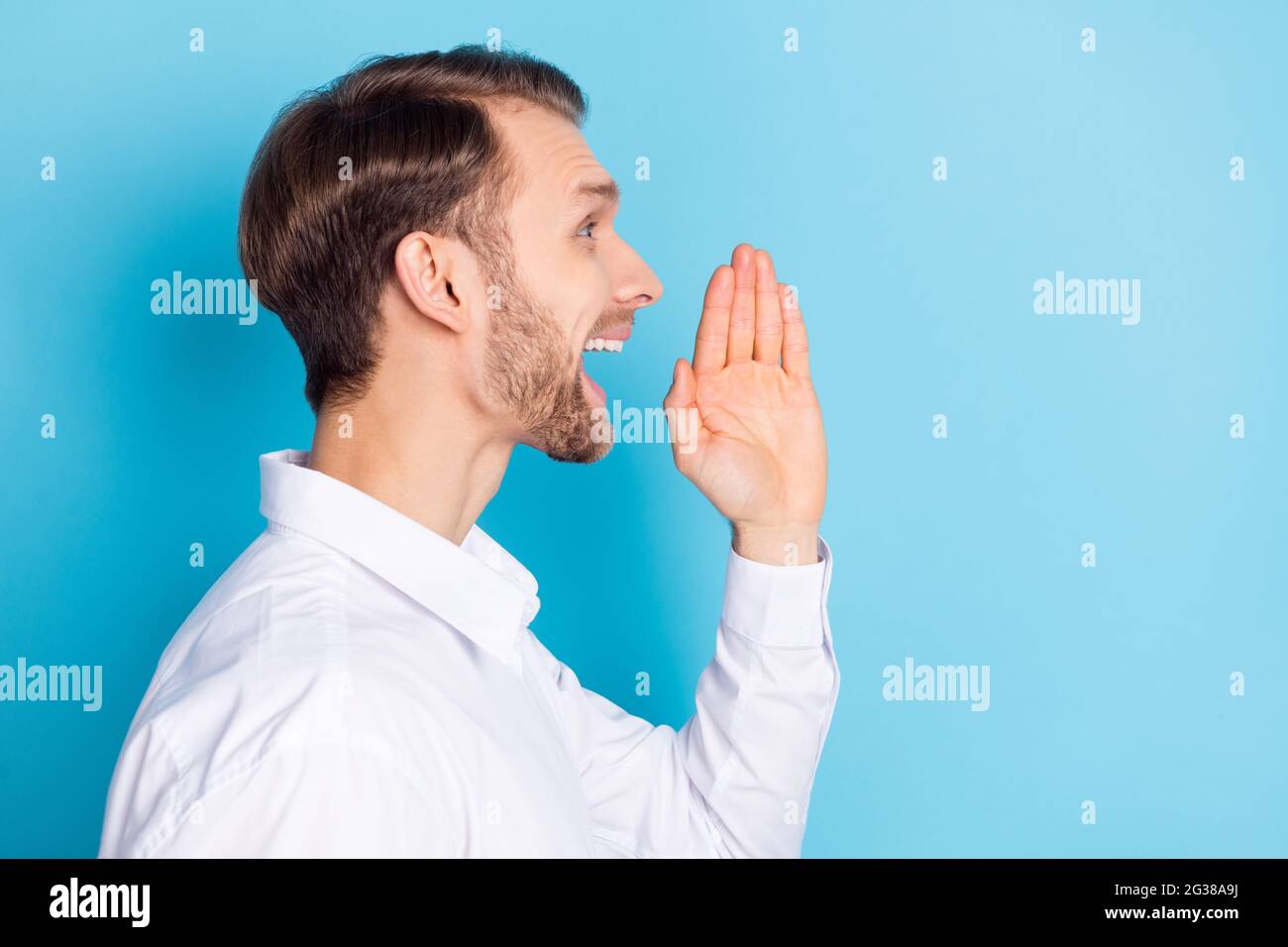 Profile side photo of happy cheerful amazed young man scream hand mouth ...