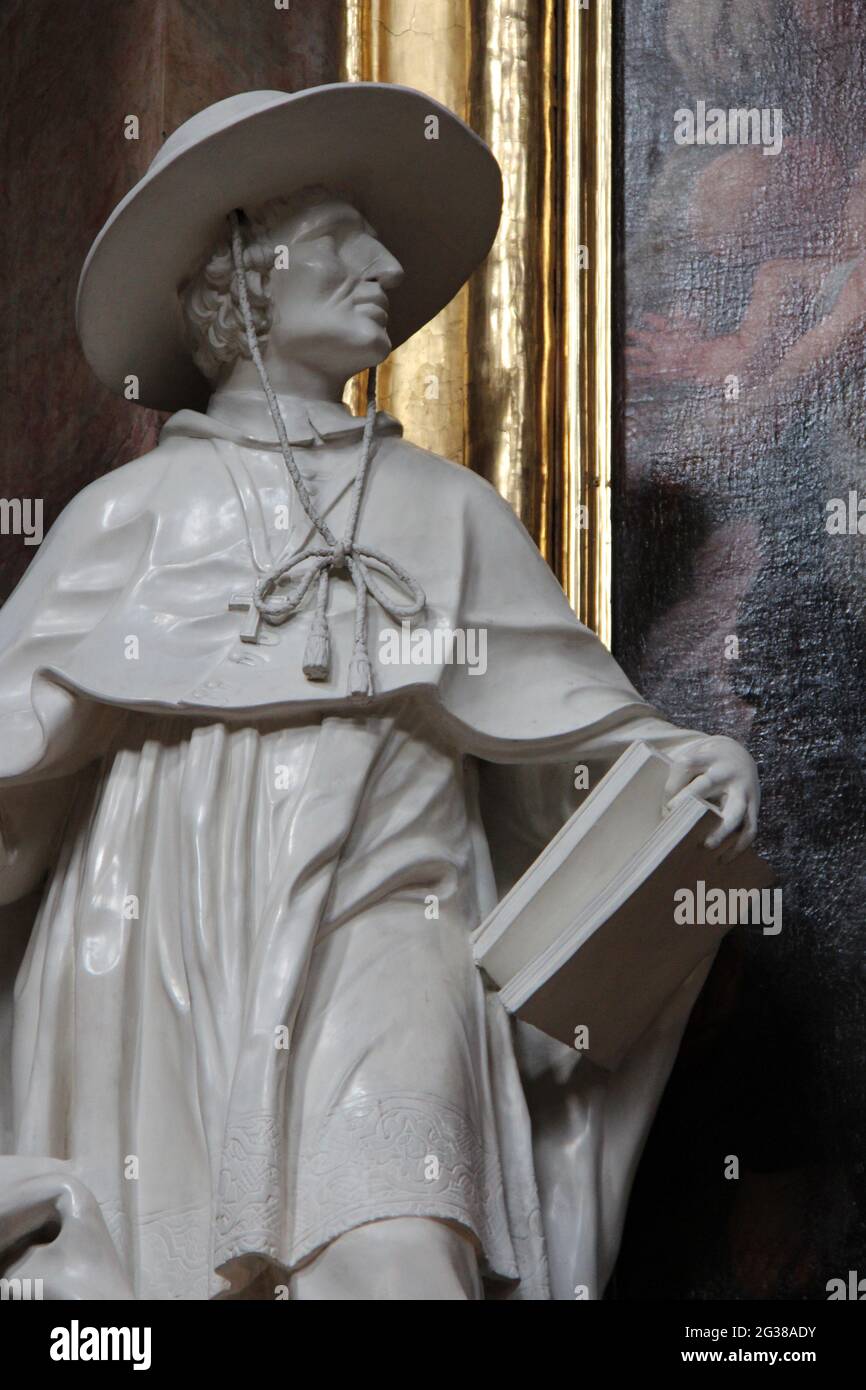 statue of a holy character in a baroque church (peterskirche) in vienna ...