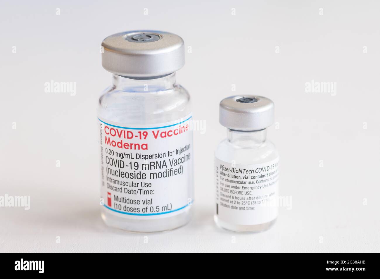 Vial of Moderna vaccine (COVID-19 mRNA, nucleoside modified) and a vial ...