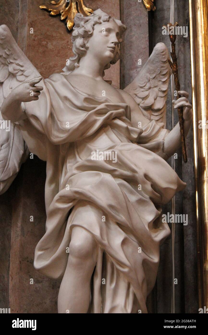 statue of a holy character in a baroque church (peterskirche) in vienna ...