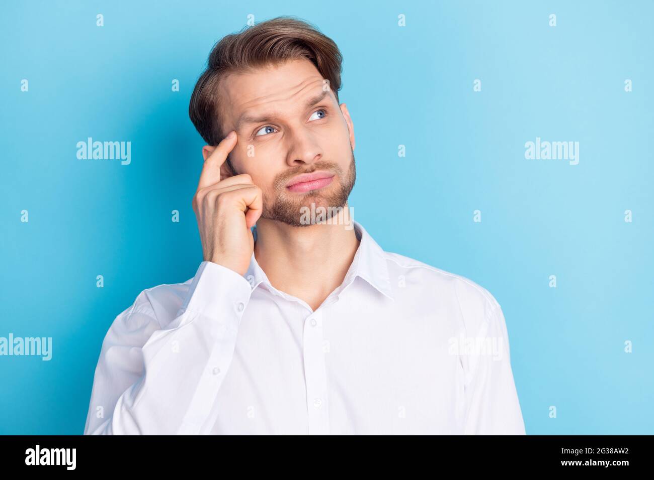 Portrait of attractive minded guy overthinking copy space clue isolated ...