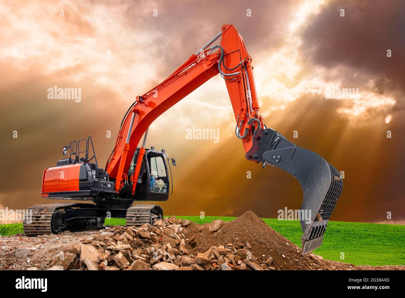 earth mover and excavator at work in construction site Stock Photo - Alamy