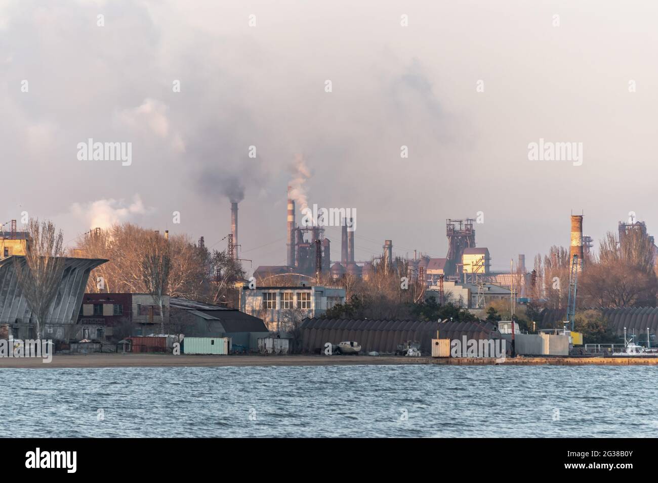 Factory with air pollution smoke from chimneys, environmental problems ...