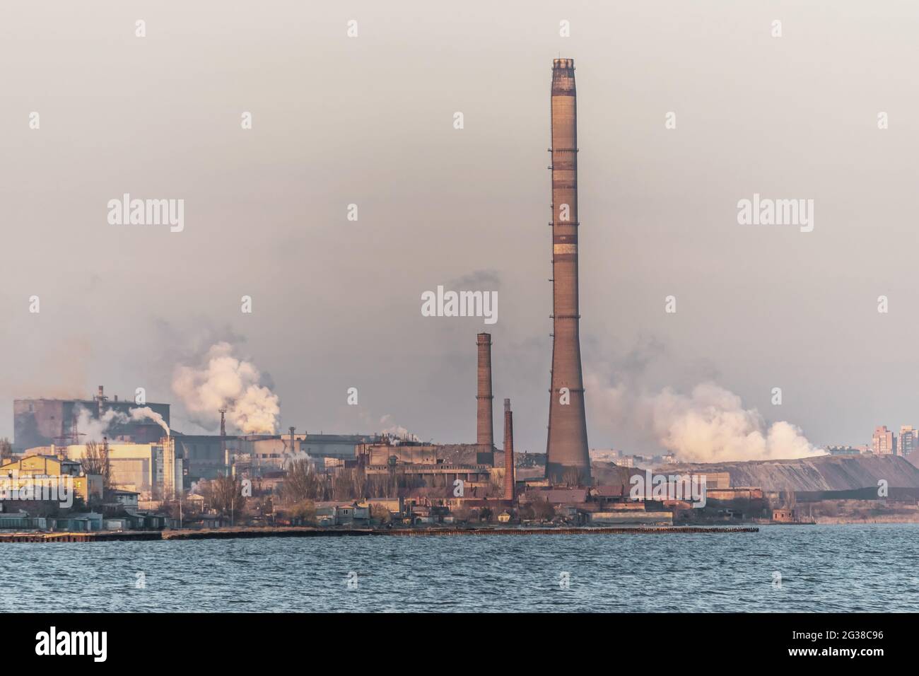 Factory with air pollution smoke from chimneys, environmental problems ...