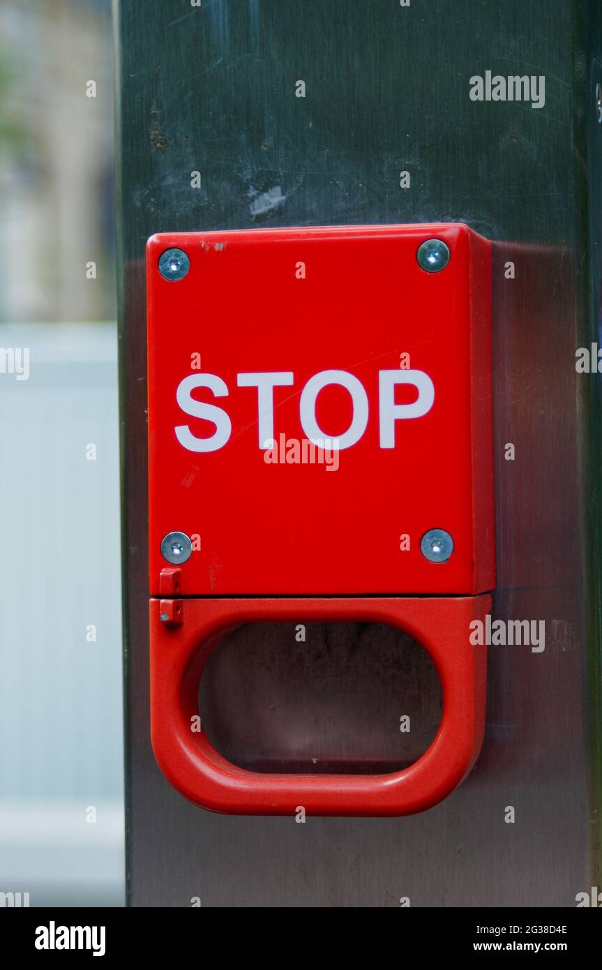 An emergency stop lever on an escalator Stock Photo - Alamy