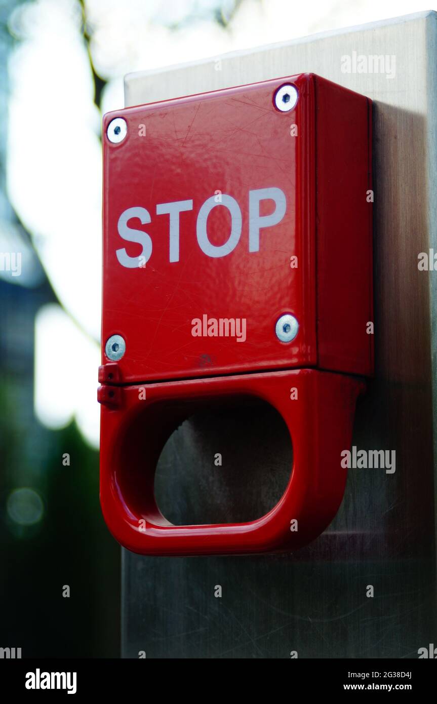 An emergency stop lever on an escalator Stock Photo - Alamy