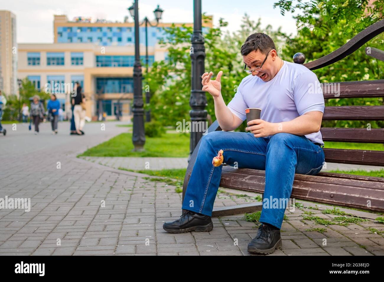 the man dropped the food on the ground Stock Photo - Alamy