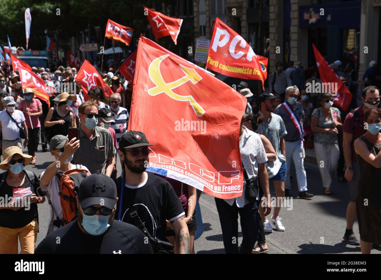 Marseille, France. 12th June, 2021. Protesters hold up flags during the ...