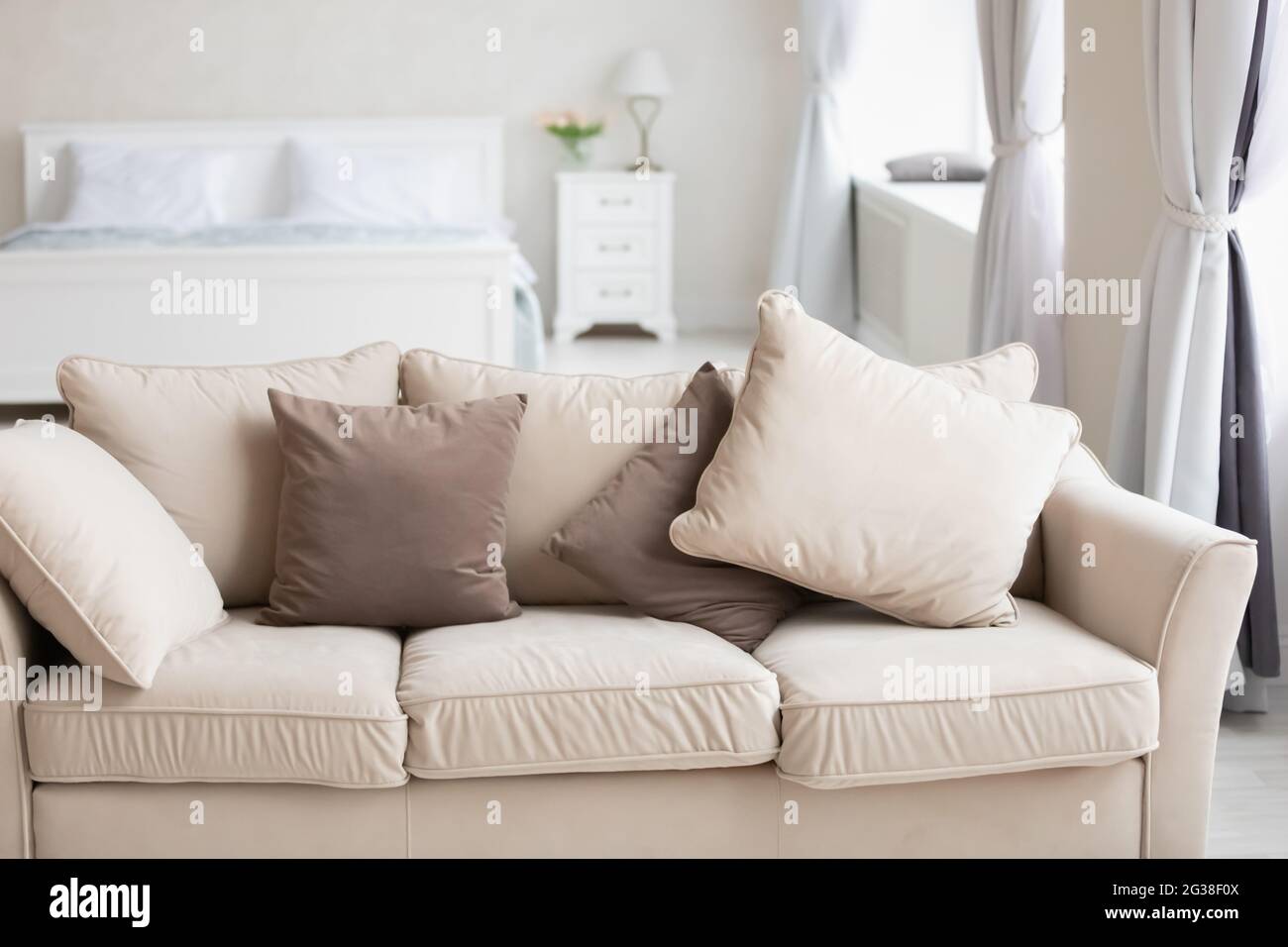 Cozy modern apartment studio or hotel room pale interior Stock Photo ...