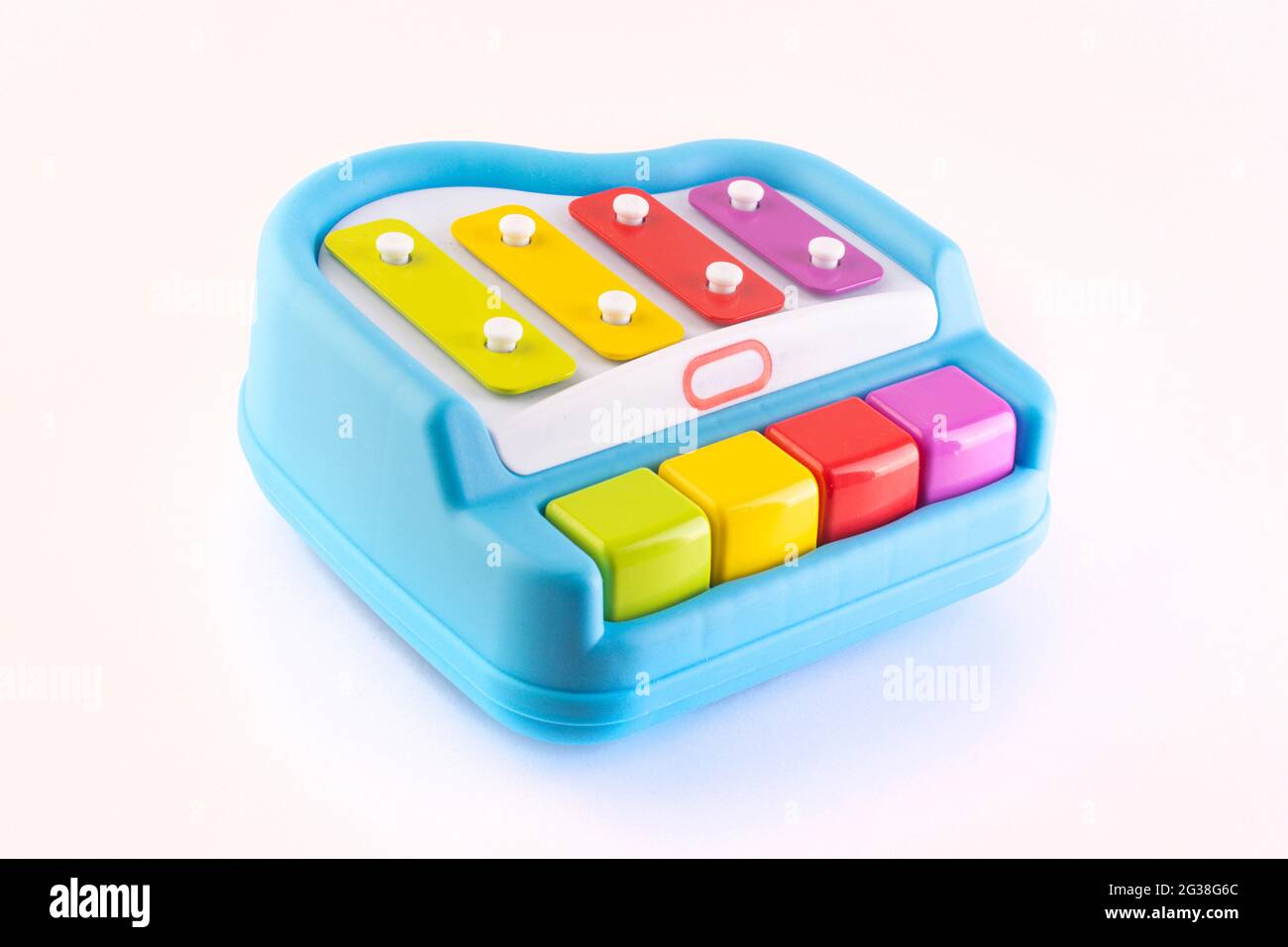 children's toy - piano with four keys on a white background Stock Photo ...