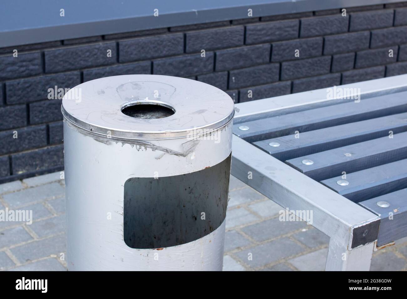 Gray street waste bin with ashtray close up Stock Photo - Alamy