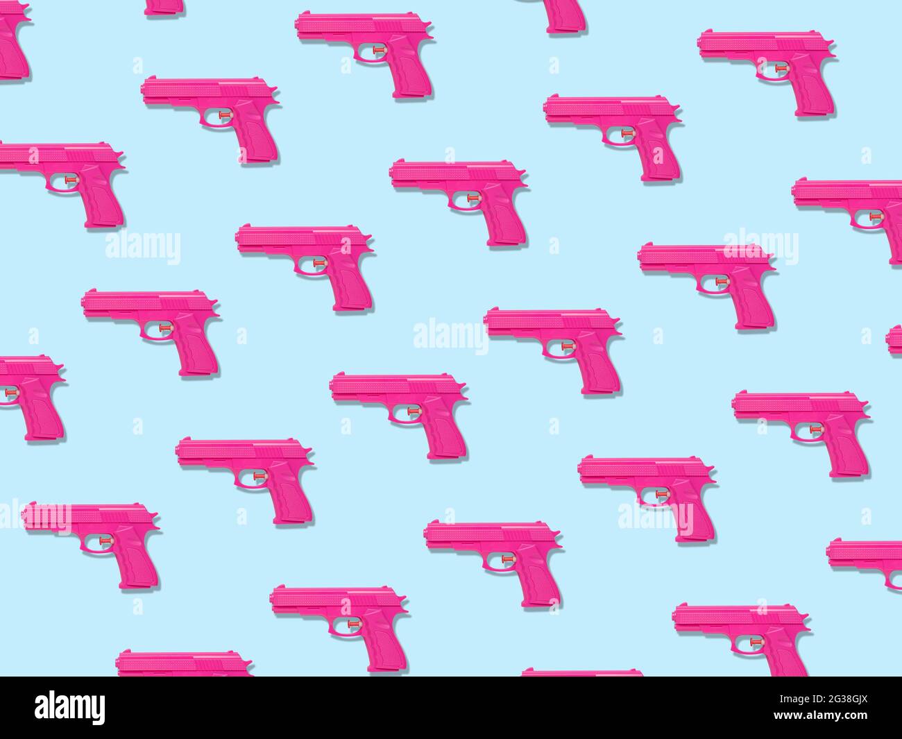 Colorful pastel pattern made of pink handguns. Minimal creative concept ...